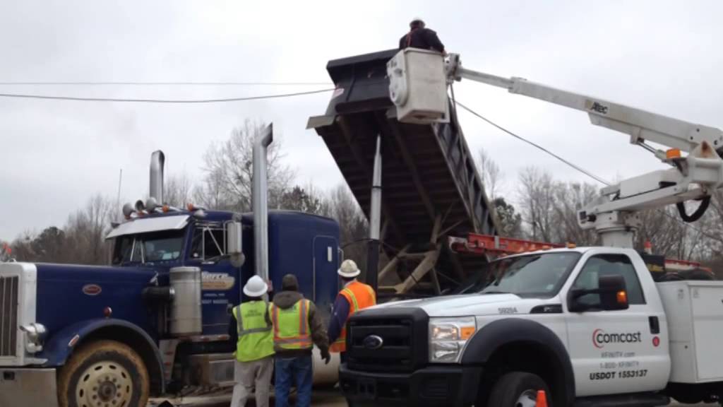 Dump truck takes down phone lines