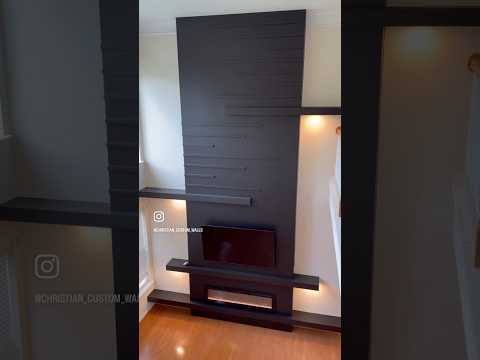 High Ceiling Black Fireplace/Tv Wall with Shelving and Lighting #accentwallideas #bestintown
