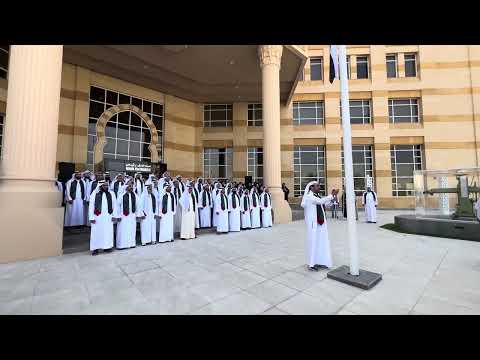 His Excellency Ahmed Darwish Al Muhairi raises the UAE flag on the...