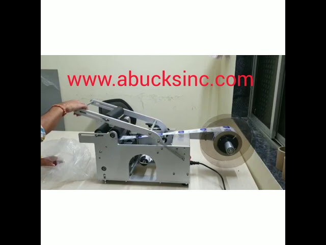 BOTTLE LABELLING MACHINES - Manual Round Bottle Adhesive Sticker ...