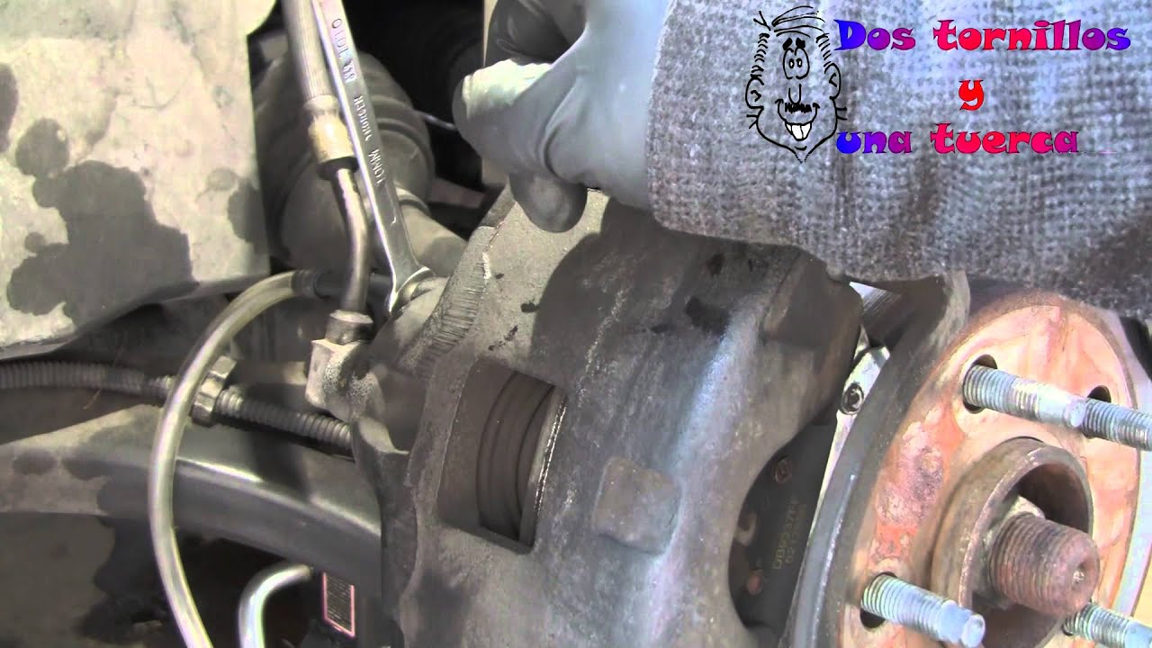 How to bleed a car's brakes with the help of another person to remove the air from the brake system