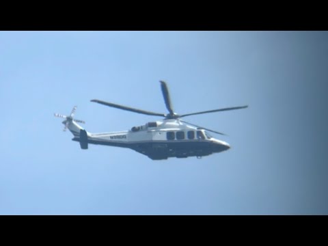 AgustaWestland/Leonardo AW139 (N98DQ) flying over Smith Point Beach