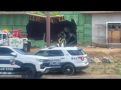 Driver dead after dump truck crashes into building under construction | WSOC-TV