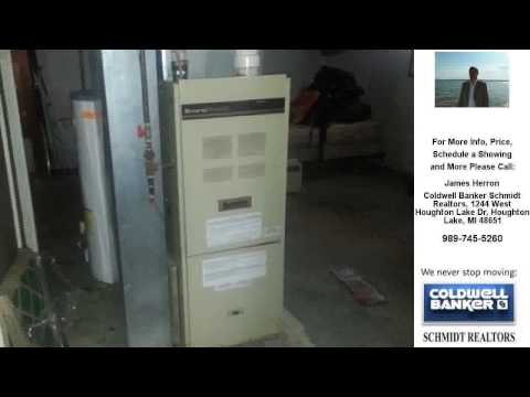 704 GEORGE, Roscommon, MI Presented by James Herron.