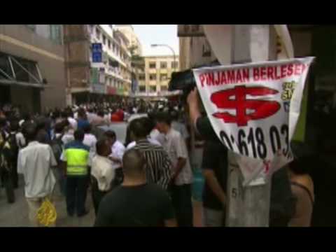 Loan sharks prey on Malaysia downturn - 26 June 09