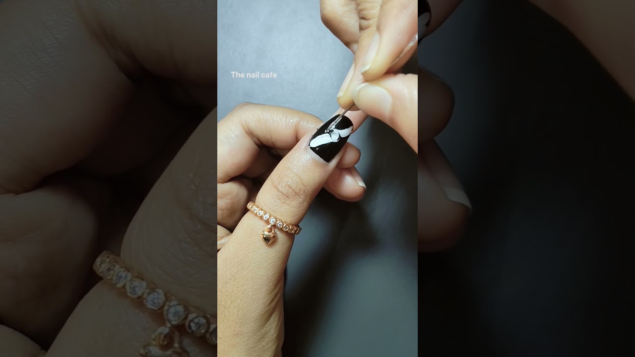 Easy nail art design with sefty pin 💅🏻🧷#shortvideo #nailartdesigns #shiningnails #nailinspo