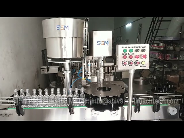 Screw Capping Machine - Edible Oil Bottle Screw Capping Machine Manufacturer from Ahmedabad