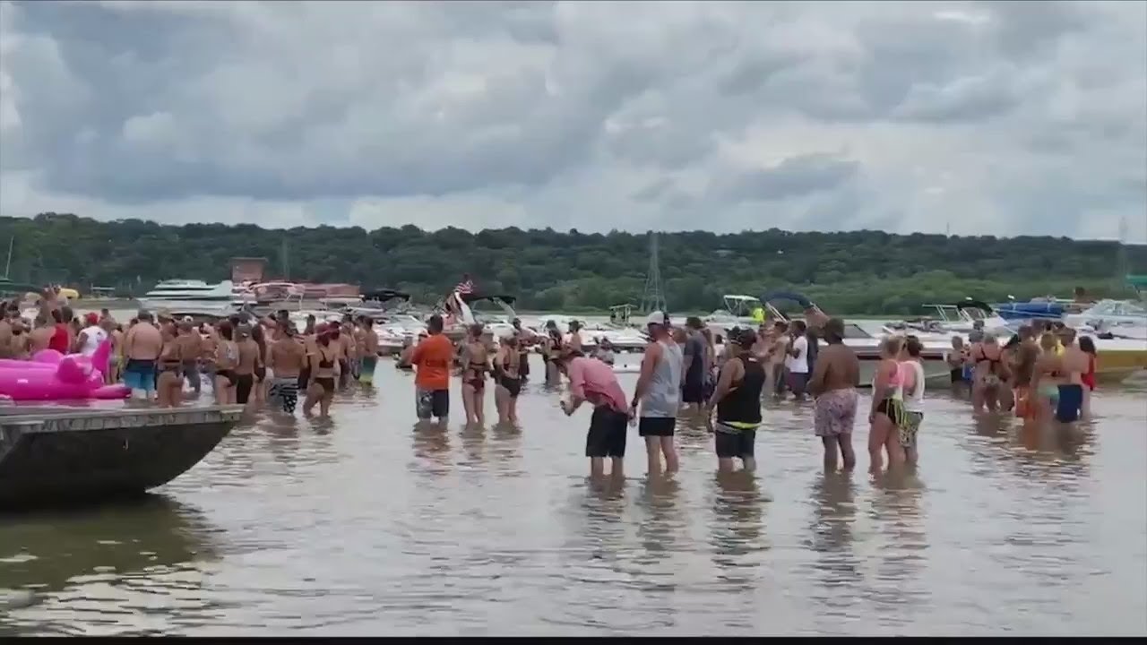 Despite rising cases numbers, thousands gather for annual 'White Trash Bash'