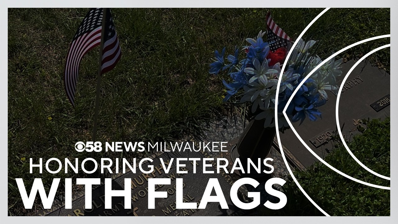 Hundreds of volunteers place flags at veteran graves in Forest Home Cemetery ahead of Memorial Day