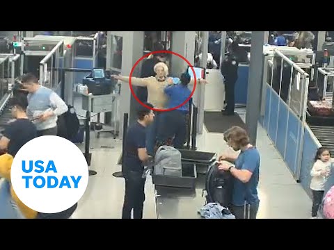 Newly released surveillance videos show accused stowaway boarding Delta flight | USA TODAY