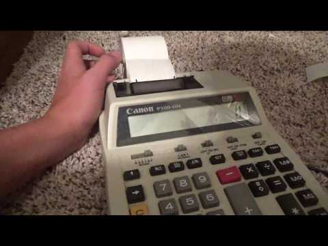 A Texas Instruments Scientific Calculator and a Canon Printing Calculator!
