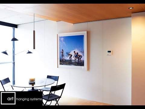 Click Rail to hang large art collection