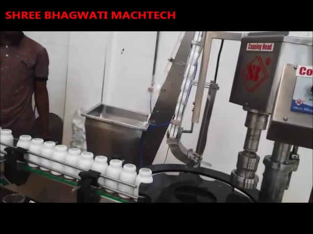Capper Machine For Bottle - Automatic Eight Head Bottle Plugging Machine Manufacturer from Ahmedabad