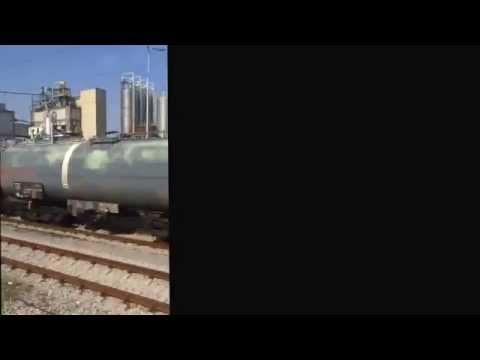 OMV oil refinery filmed at high speed near Schwechat, Austria - modern urban movement, high energy