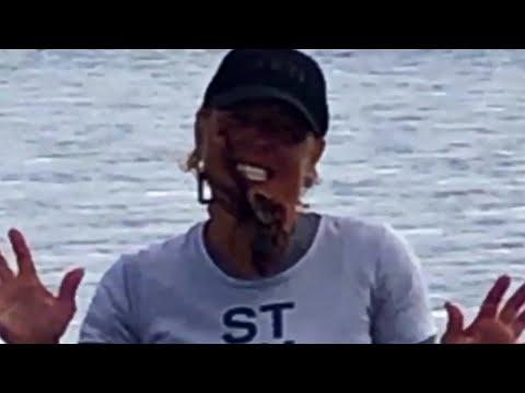 Octopus bites woman's face during photo