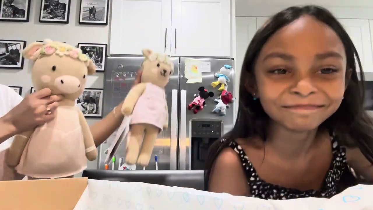 Sophia unboxes Cuddle + Kind dolls