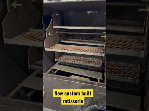 Custom Rotisserie Smoker with a pellet assist Bad Boyz BBQ.