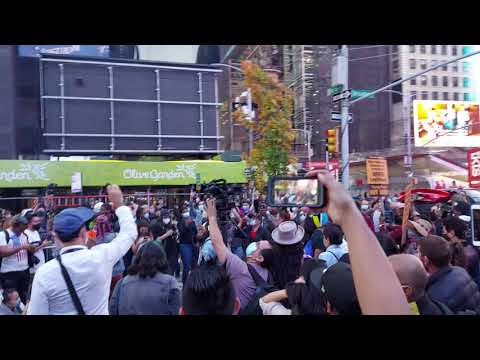 People dancing and celebrating to FDT on Times Square (November 7th 2020) Biden declared winner