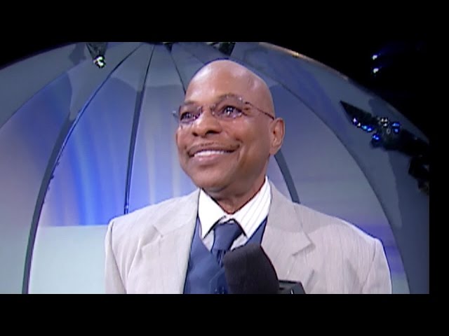 Teddy Long tells story about his WWE action figure