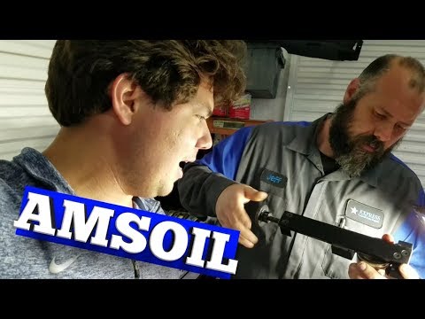 Cutting open AMSOIL Ea Motorcycle Oil Filter