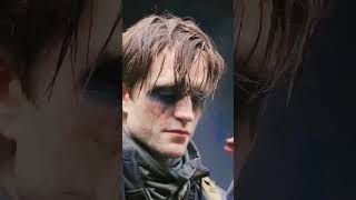 Matt reeves oversees Robert Pattinson's eye makeup for 'The batman'.