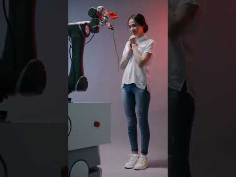A Robot Giving a Flower to a Woman #short #shortclip #shortvideoclip