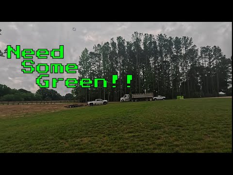 Menambahkan Tanah Atas dan Benih Rumput