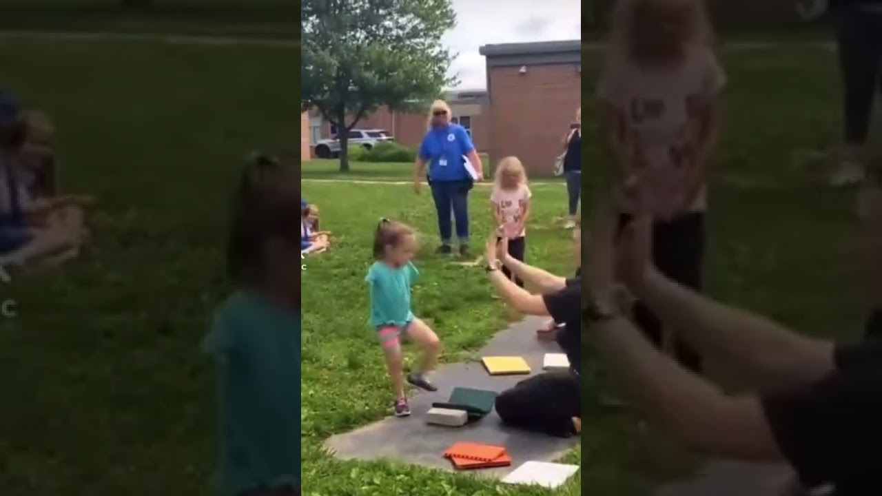 guy tries to high five girl with no arms