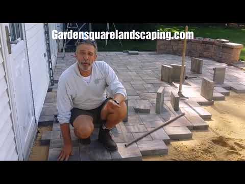 Sand and screed rails for interlocking pavers