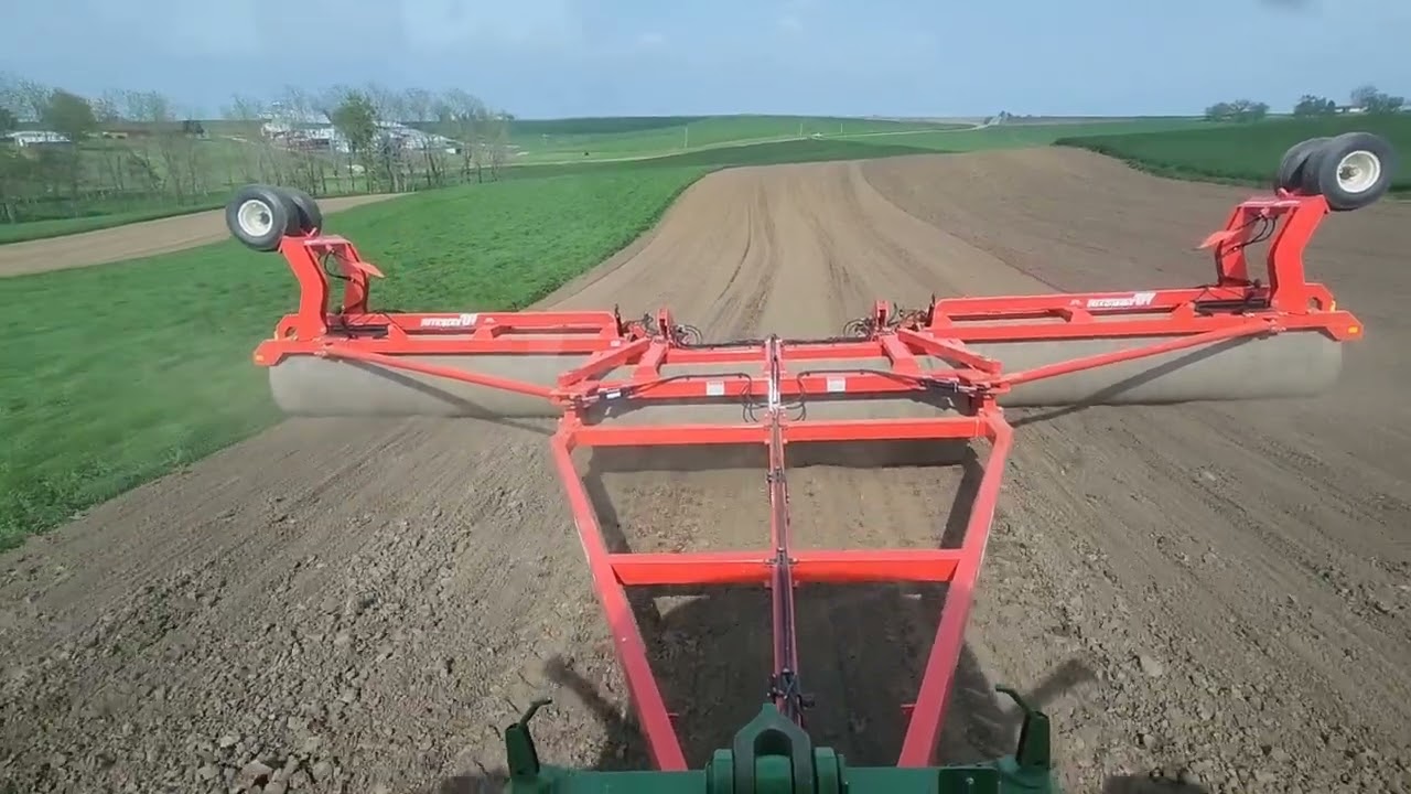 Running the Riteway Landroller across the fields