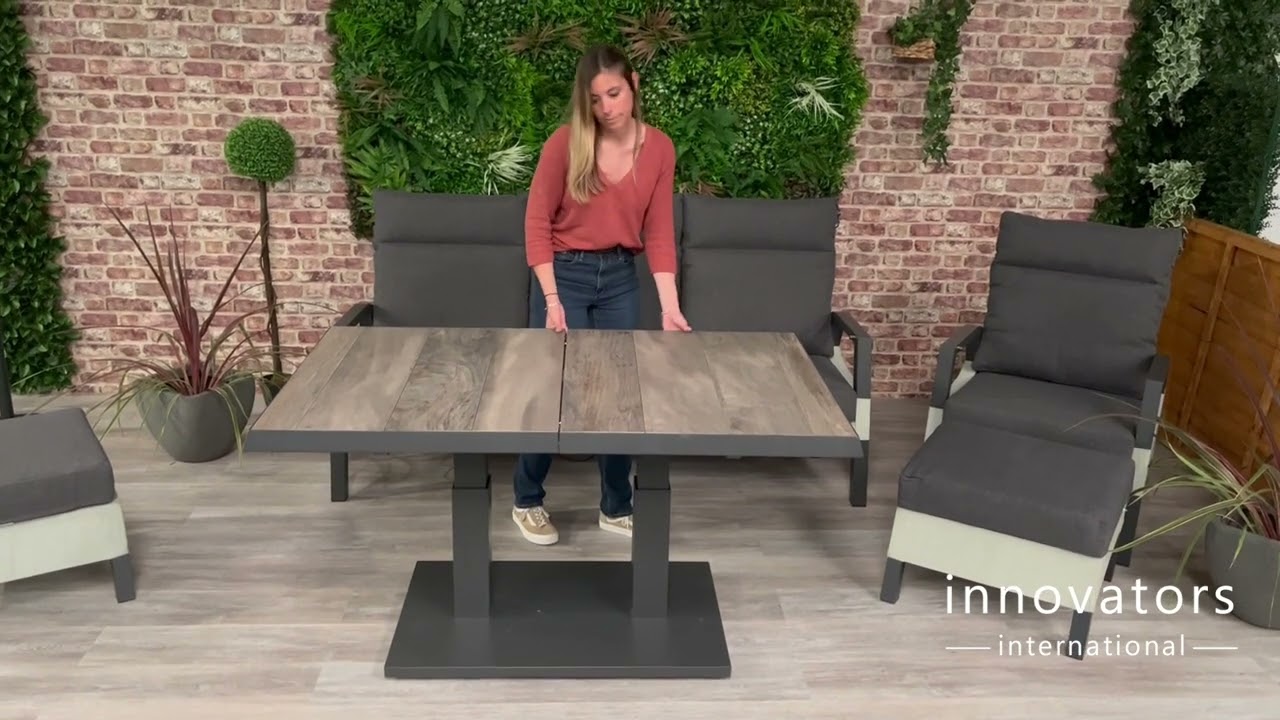 Height adjustable and extending dining table