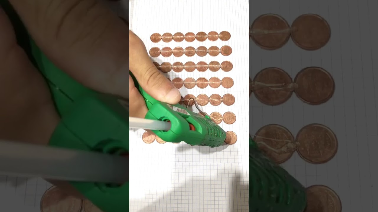 Cuadro de monedas de un céntimo con resina