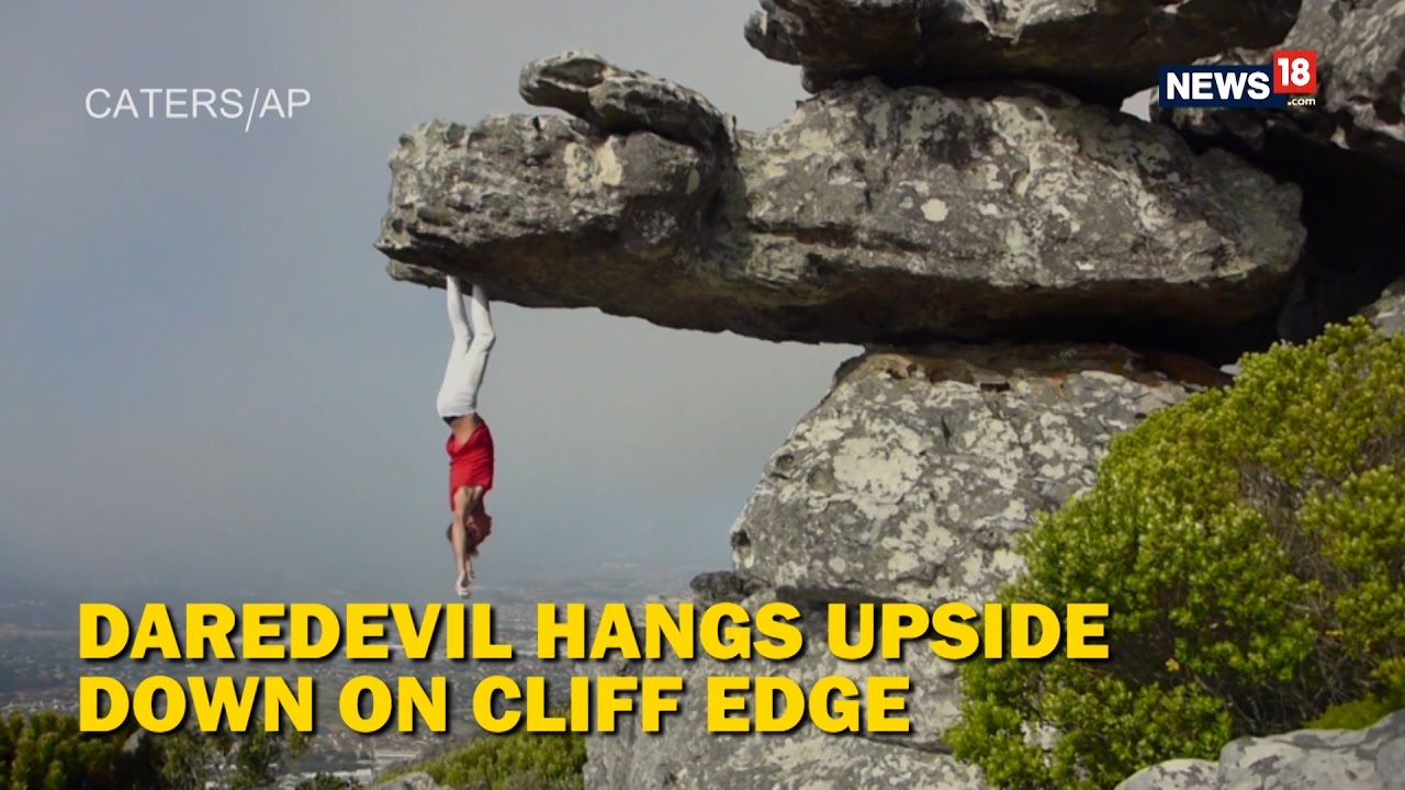 Daredevil Hangs Upside Down On Cliff Edge