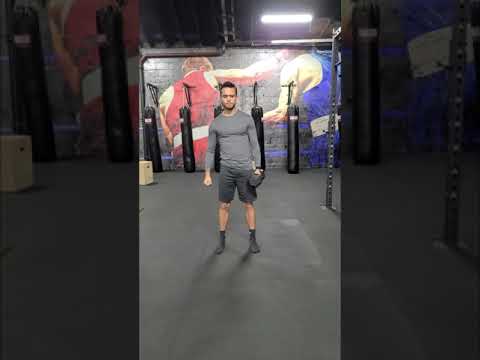 Standing Oblique Crunches - Dumbbell