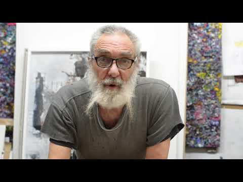 Terry Cooper explaining the meaning of his curated art exhibition, 'Two Trees Talking'