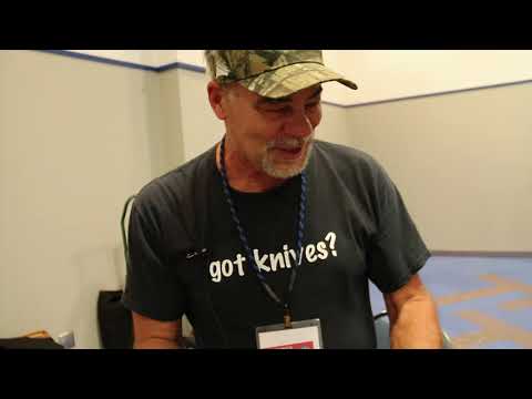 Jim Roberts of "HACKSAW BLADES" demonstrates his varied knife collection