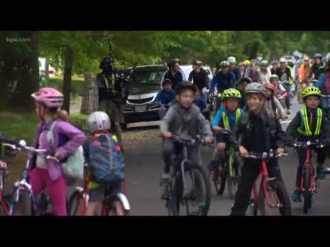 The Unipiper leads a bike ride at Llewellyn grade school