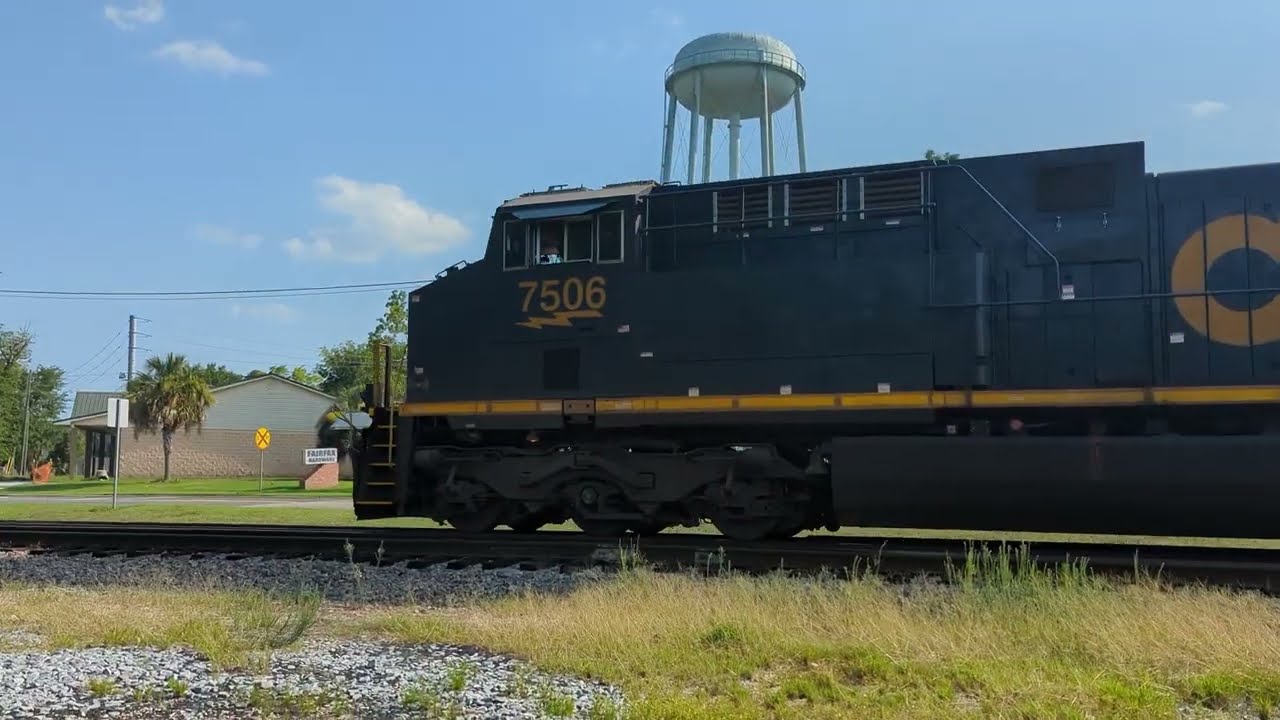 CSX 7506 Leads M691-24 with SD40-2 trailing and shave and a haircut