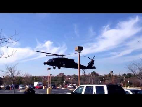 Uh-60 landing in parking lot