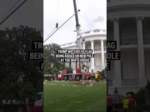 Trump watches US flag being raised on new pole at the White House