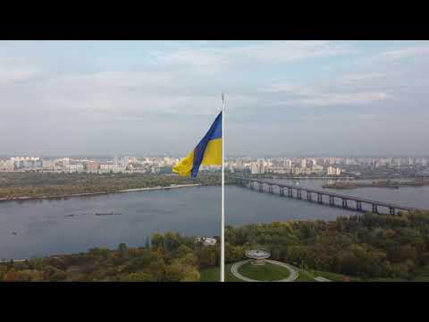 Aerial view of giant Ukrainian flag.
