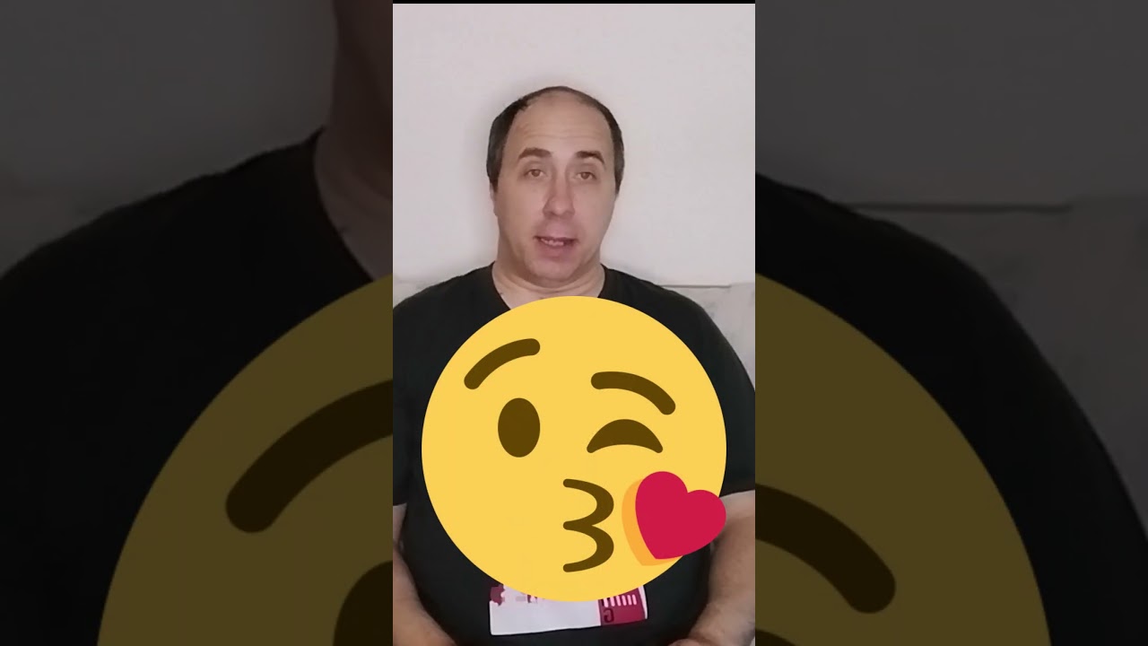 Meaning of the emoji face blowing a heart kiss