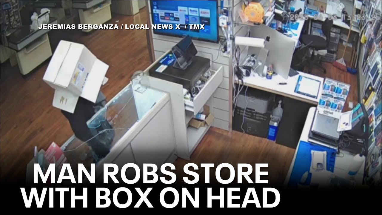 Caught on camera: Man robs store wearing box on his head