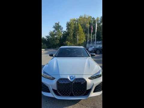 Unleash Your Style with the Brooklyn Grey on Tacora Red BMW i4 M50 | BMW of West Springfield