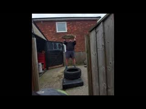 100kg sandstone stone lift & attempted press