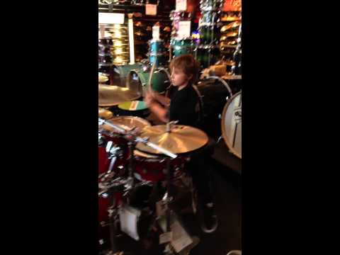 Jagger jamming at Sam Ash drum store in Los Angeles off cut and unedited watch the drum stick break