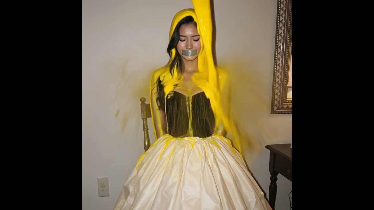 Girl that is tied, gets slimed.