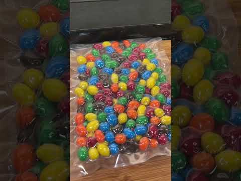 Vacuum sealing a bag of M&M’s #shorts