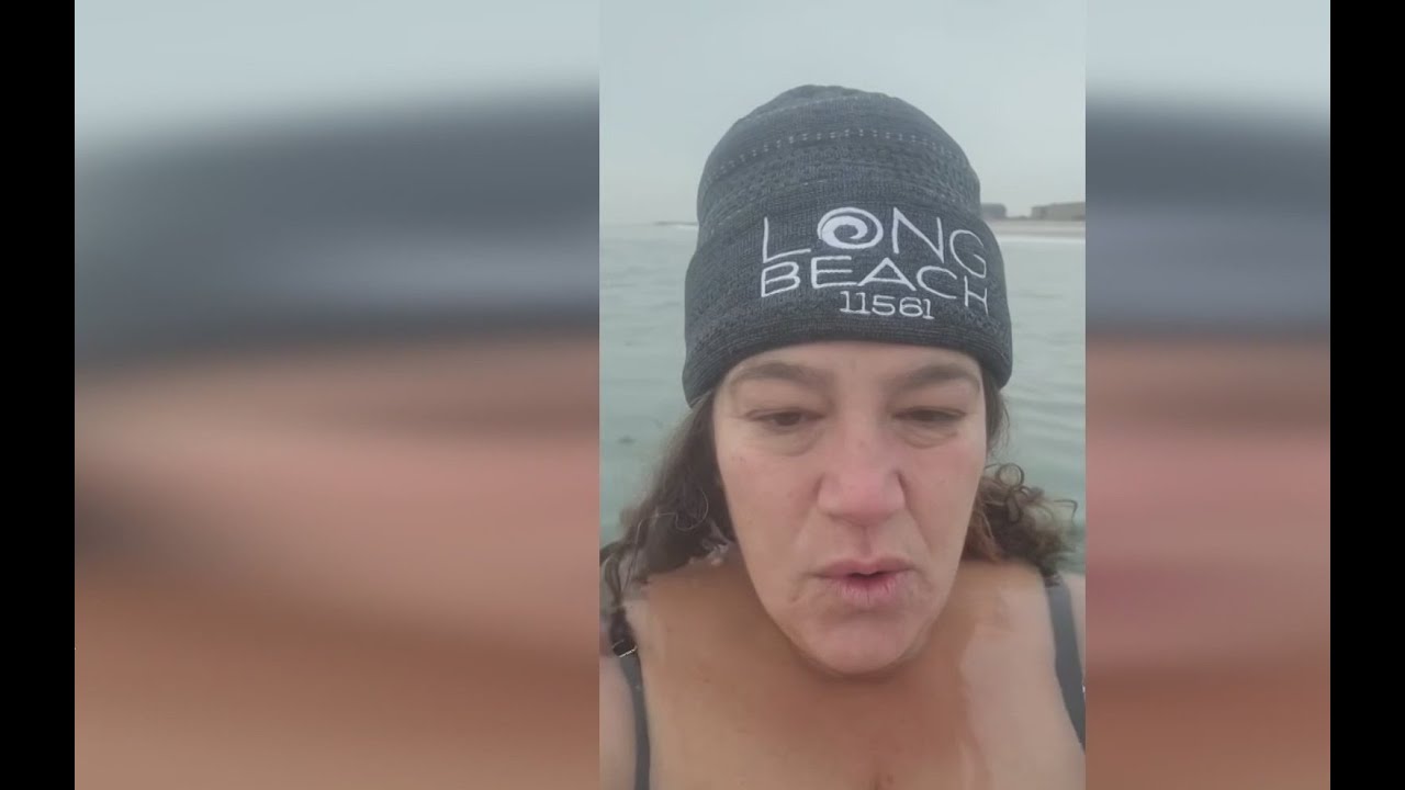 New York woman finds solace in ocean after father's death