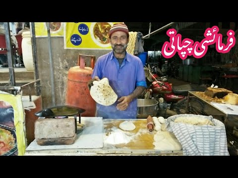 man cooking farmaishi chapati Only 10 Rupees! Tawa Roti_ street food